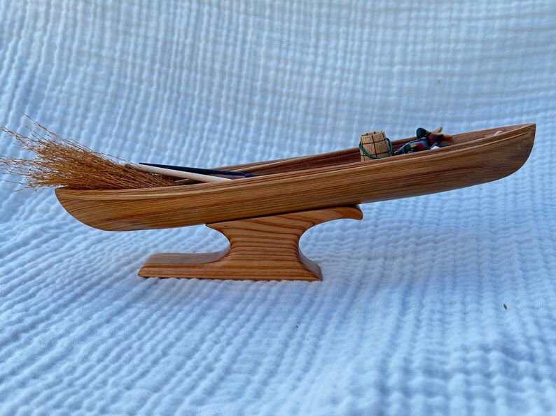Cypress Dugout Canoe With Shotgun, Duck Decoys, Paddle, and Push Pole ...