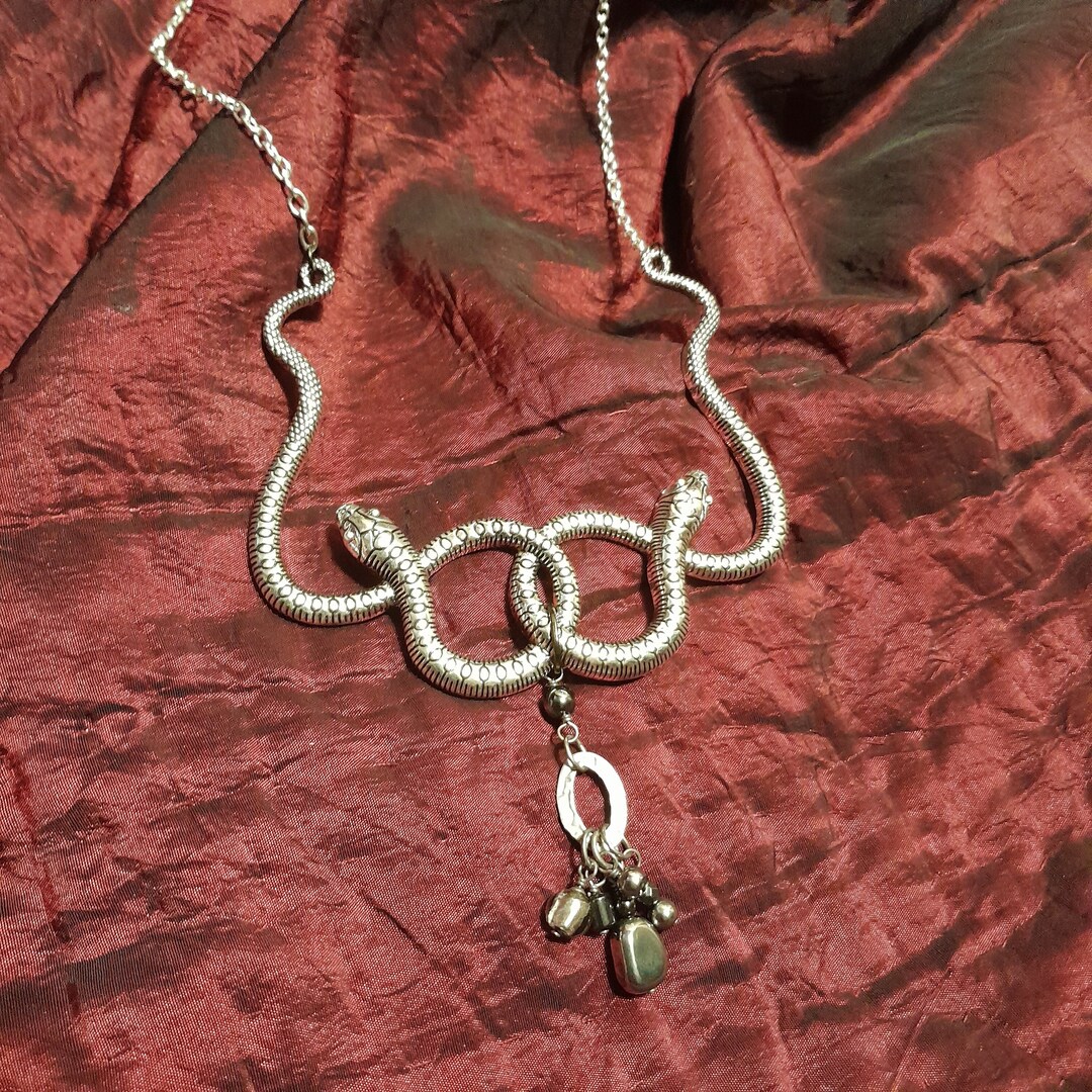 Serpentine Healing: Entwined Silver-toned Snake With Elaborate Vintage ...
