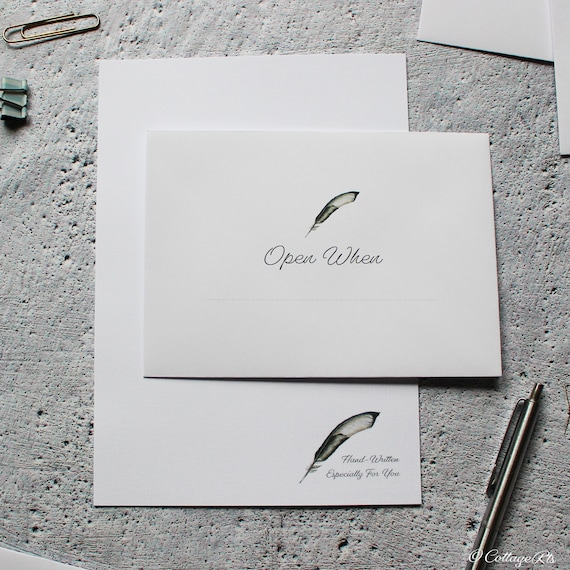 Quill Writing On Paper