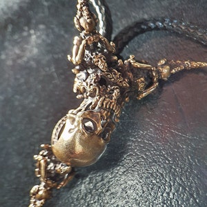 Evil Within Skull and Demonic Head Buddhist Relic Charm Pendant ...