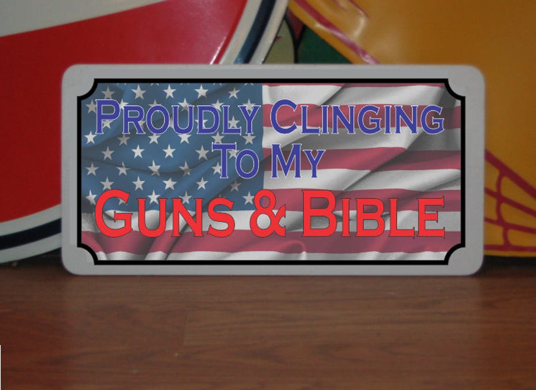 Proudly Clinging to My GUNS & BIBLE Metal Sign USA American Flag ...