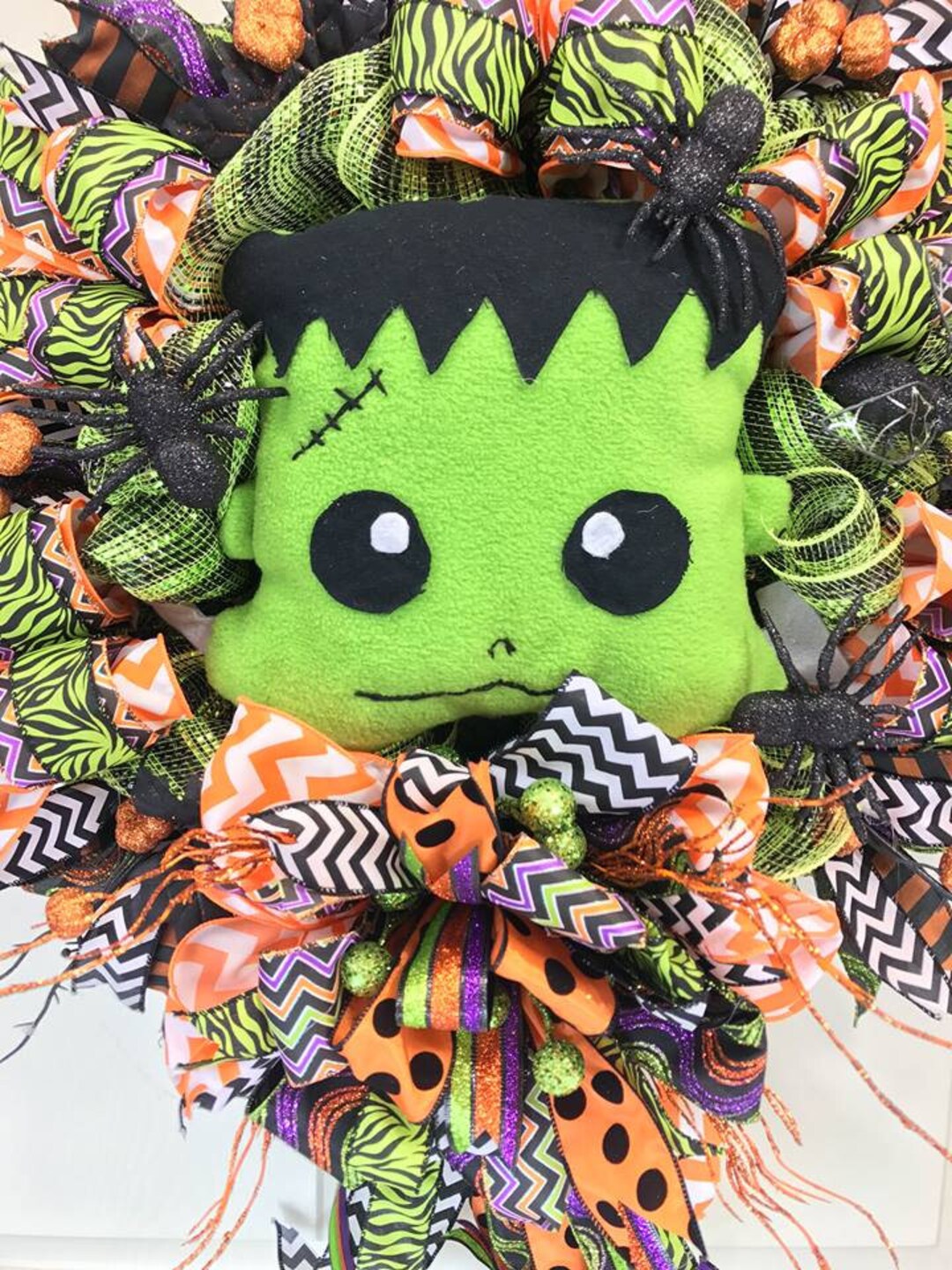 Deco Mesh Wreath Tutorial - Halloween Wreath Tutorial - Adding a ...