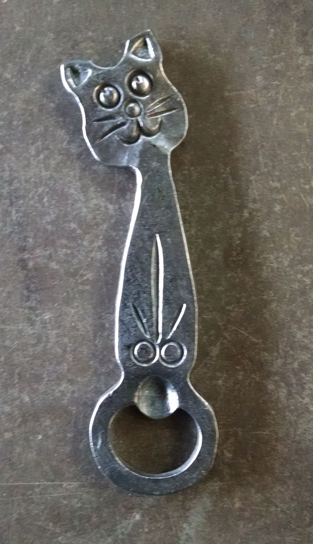 Hand forged iron cat bottle opener | Etsy