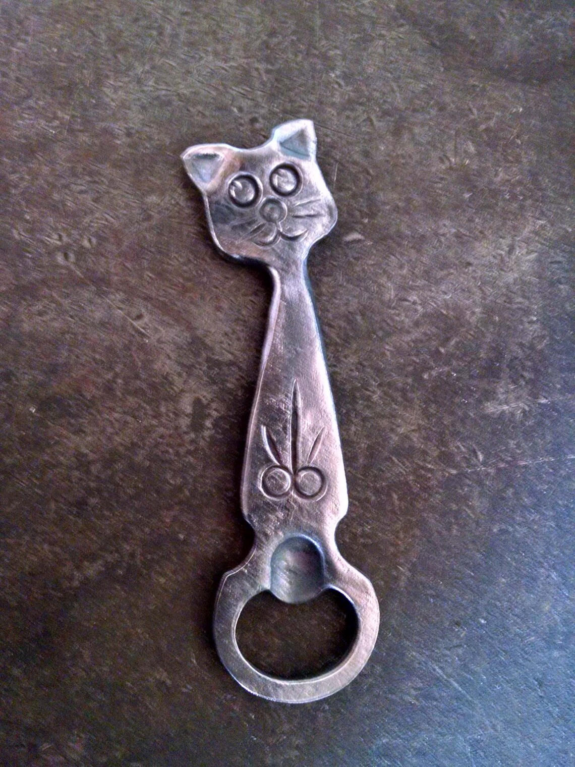 Hand forged iron cat bottle opener | Etsy