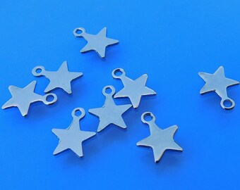 Small silver stars | Etsy