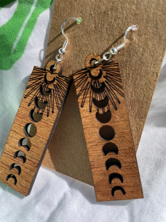 Hawaii Wooden moon phase earrings with tropical leaf design made in Hawaii