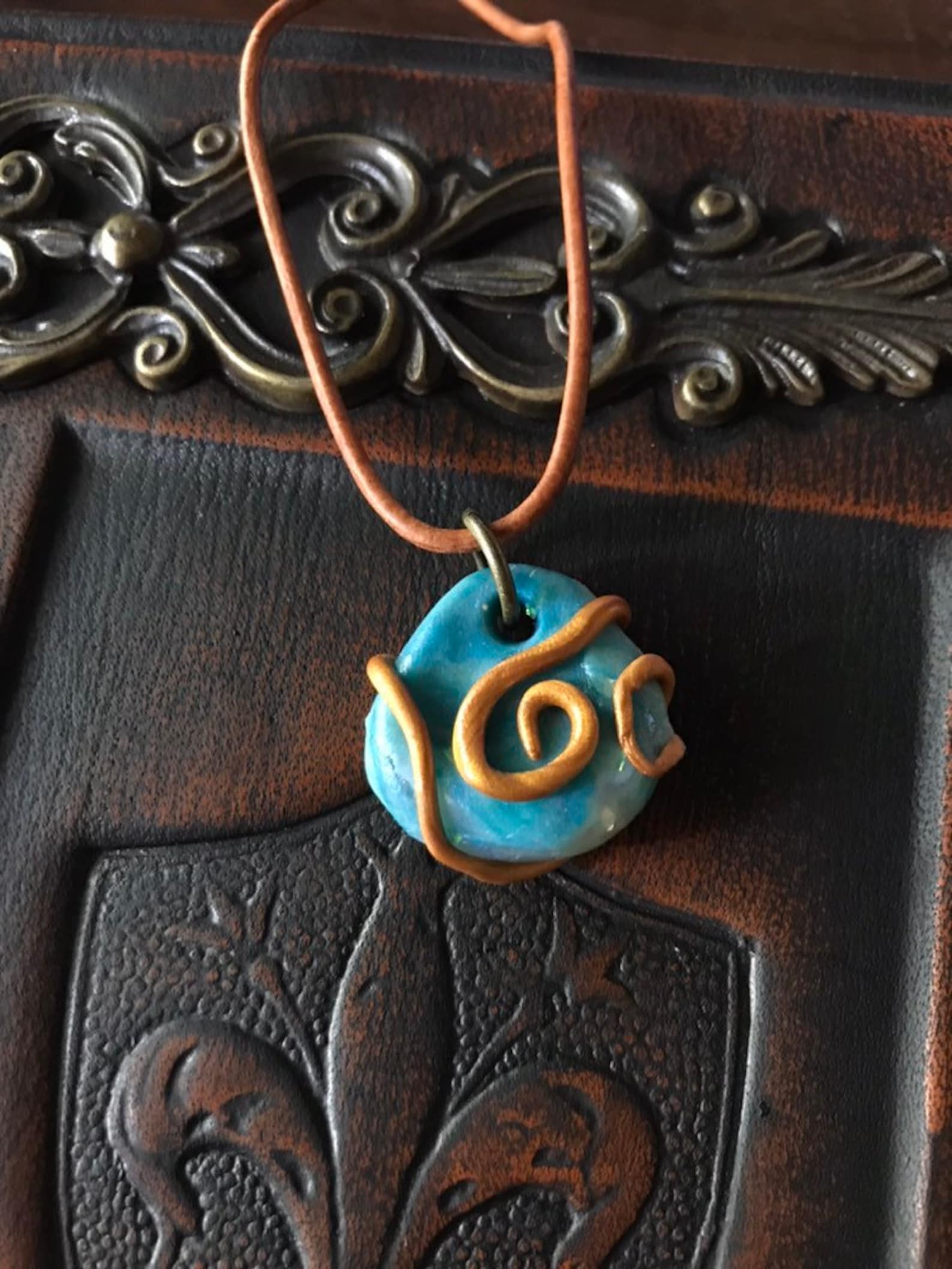 Magic Blue and Gold Swirl Amulet - Etsy