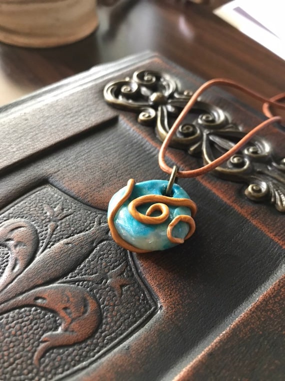 Magic Blue and Gold Swirl Amulet | Etsy