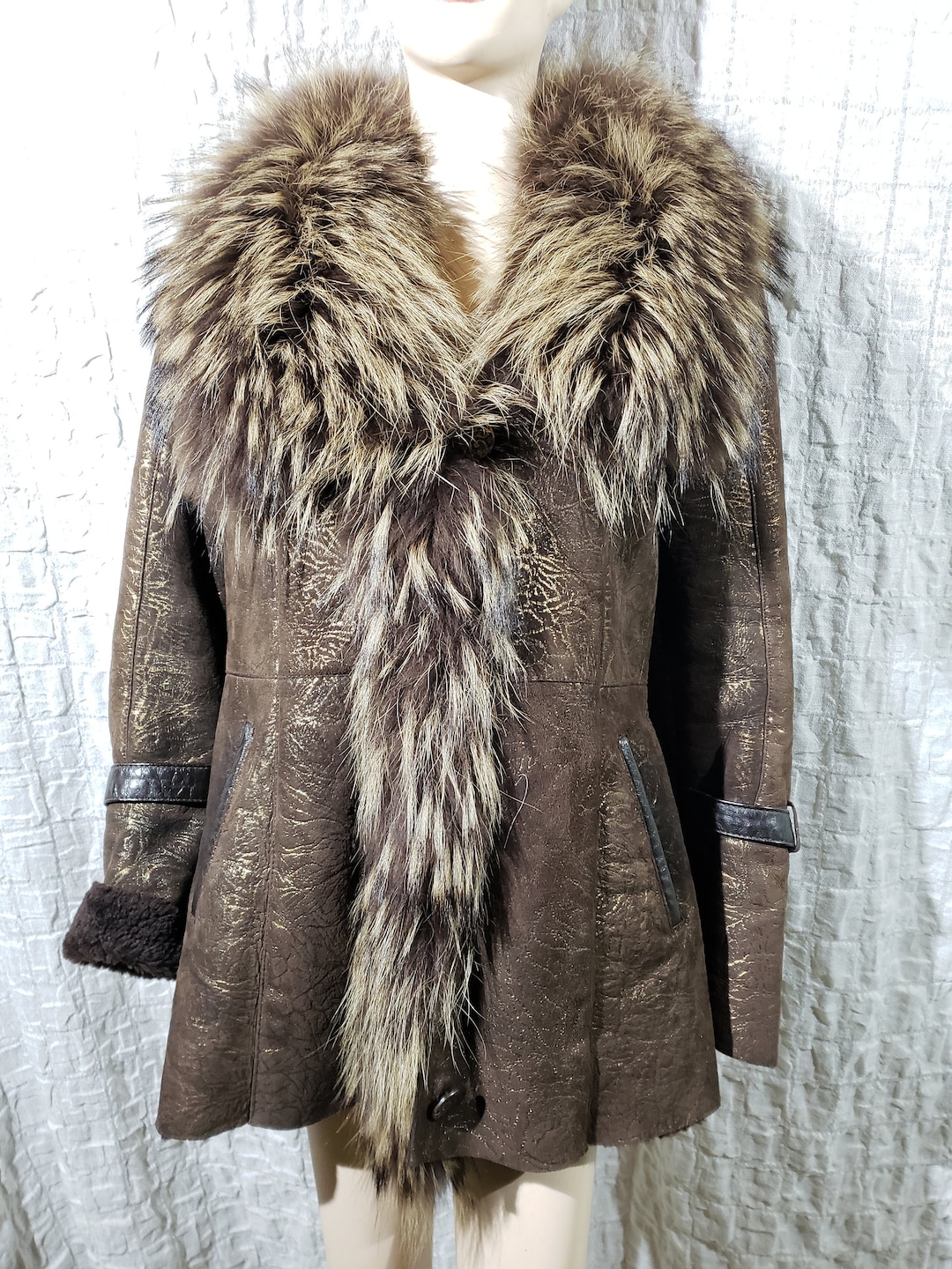 A Wonderful Women's Warm Sheepskin Coat Made of Genuine Fur. Stylish ...