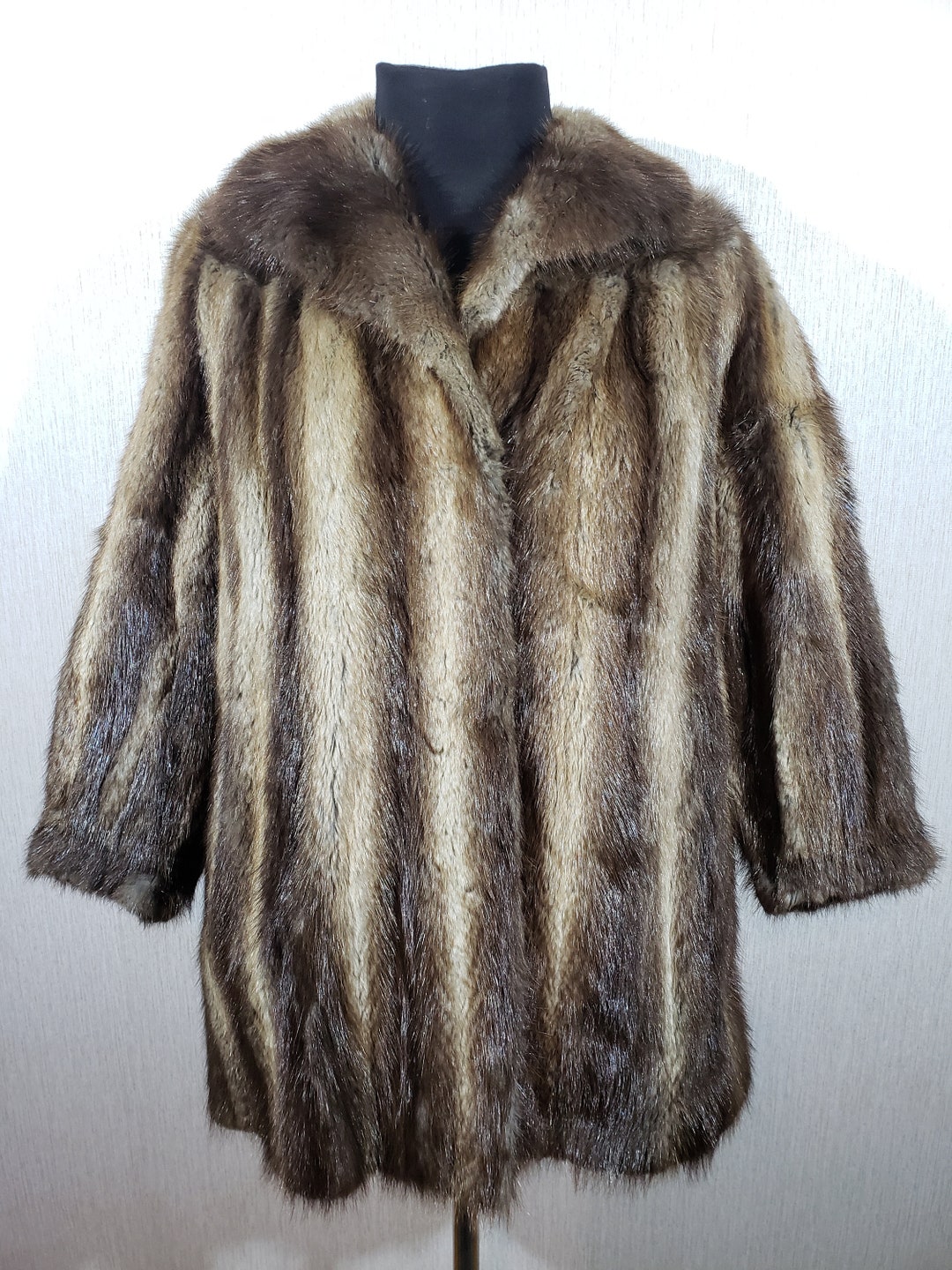 Comfortable Fur Coat Made of Genuine Muskrat Fur. Warm Brown Women's ...