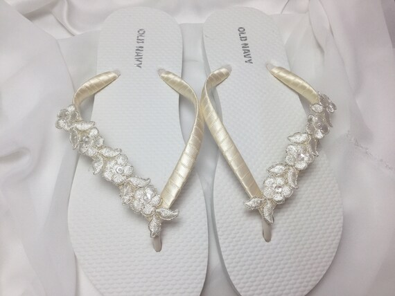 Ivory flip flops store