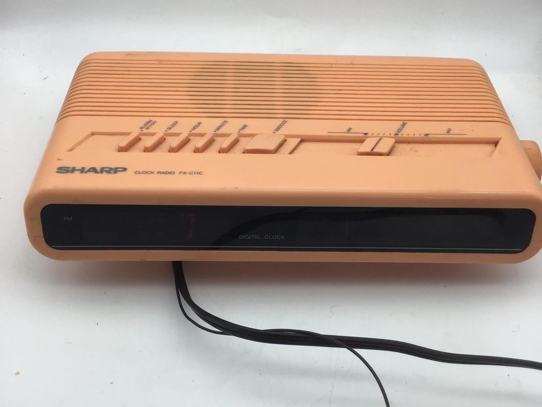 Pink/peach Sharp 1980’s AM/FM Radio Digital Alarm Clock Radio, Model FX-C11C. Made in Hong Kong ...