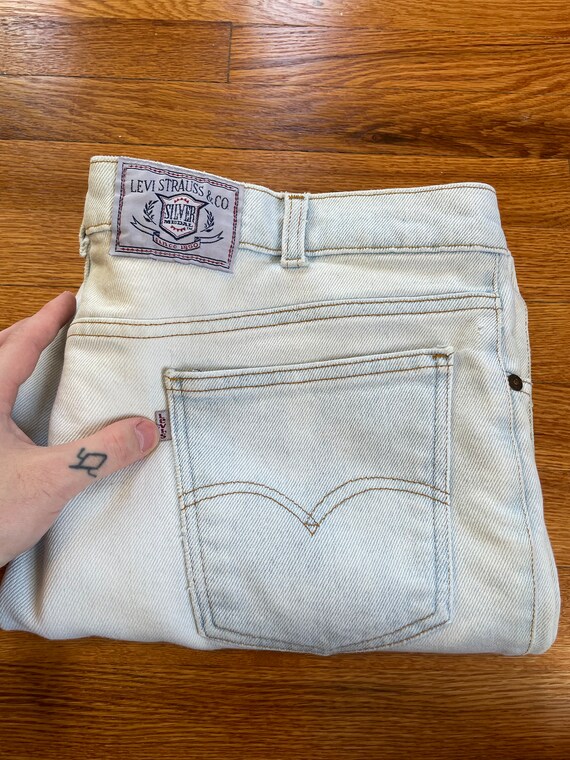perfectly distressed and stained 80s/90s Levis Silver… - Gem