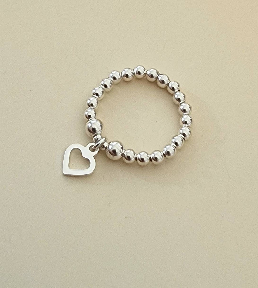 Sterling Silver Beaded Stretchy Ring With an Open Heart Dangle - Etsy UK