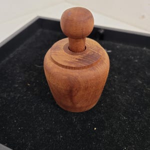Vintage wooden cookie press store