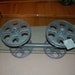 Movie Reel Table Made From Repurposed 35mm Movie Reels With Film Choice ...