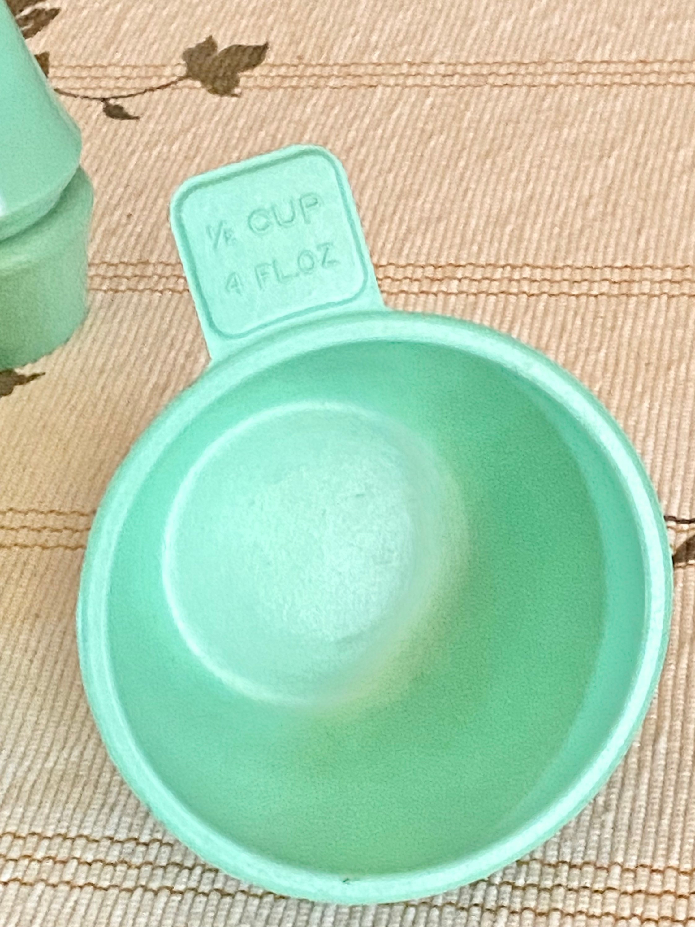 Art Deco era Helix bakelite green measuring cups and salt & pepper shakers