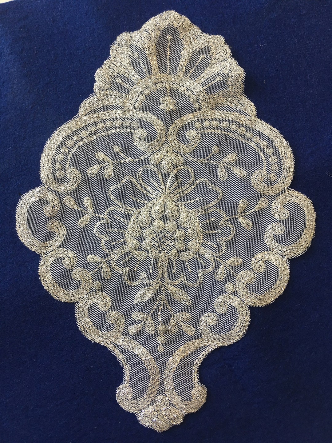 Floral Motif With Silver Mylar on White Polyester Net. 11 1/2" by 8". 5 ...