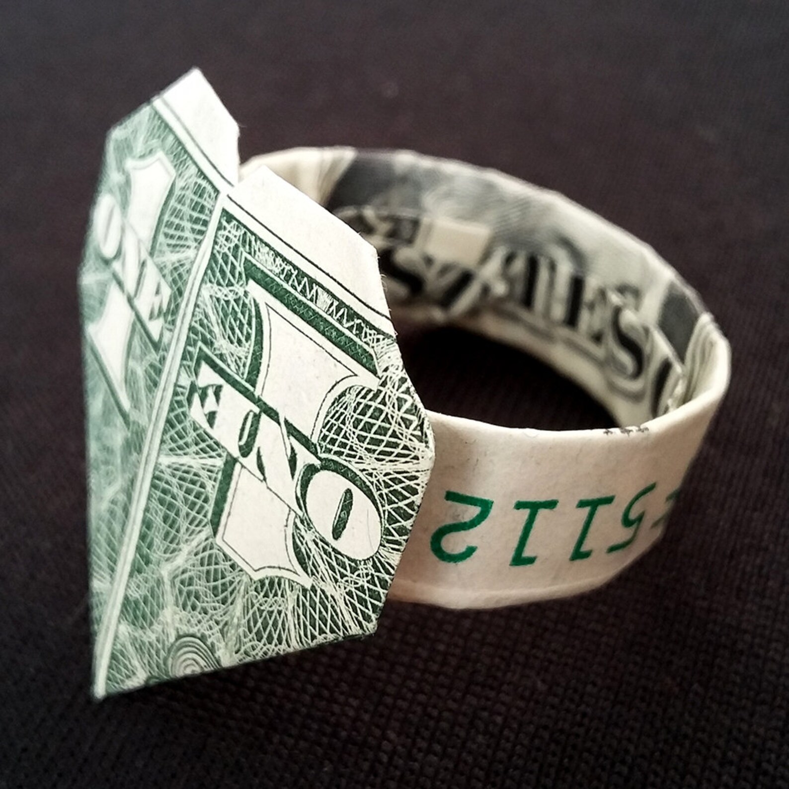 Dollar ring origami - Wasinvestment