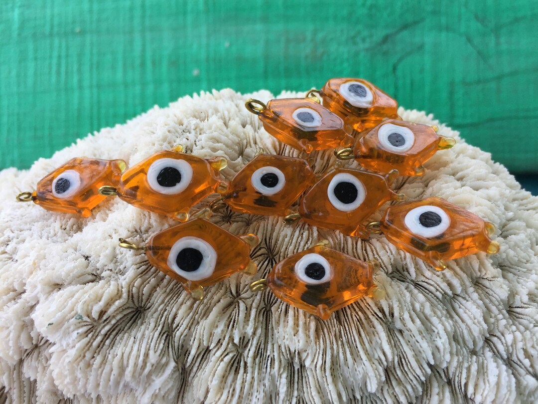 SUPPLY: 12 Glass Fish Evil Eye Charm - Embedded Brass Wire Glass Fish ...