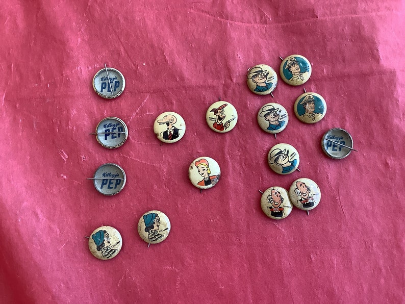 Lot of 16 - 1945 Kellogg’s PEP Comic Strip Pin Back Buttons - See Desc ...