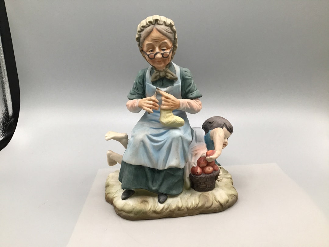 Amico Inc., 1975 Japan-7”t Bisque Figurine- Old Woman Darning a Sock ...