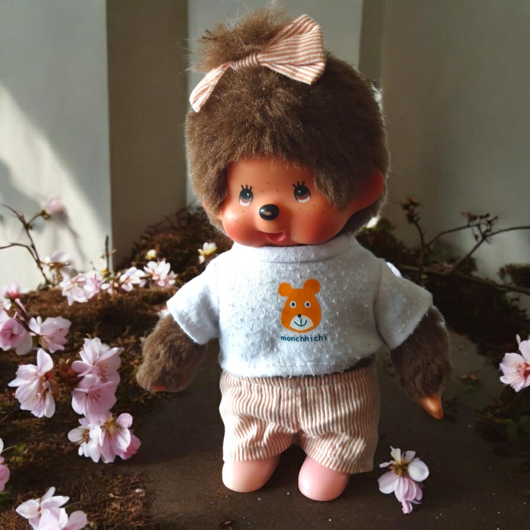 Monchhichi Girl With Monchhichi T Shirt Striped Trousers and Pink Shoes ...