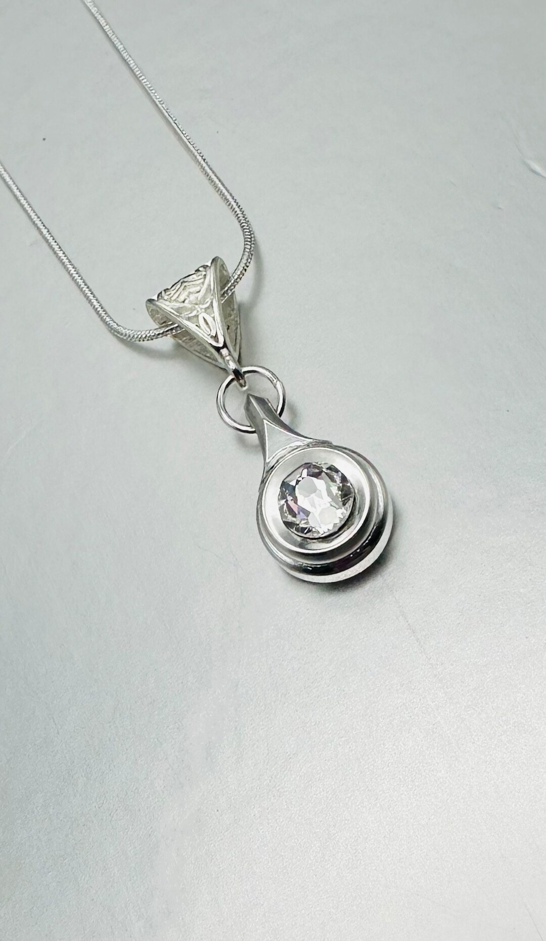 Silver Piccolo Key Necklace With Swarovski Crystal Hanging From a ...