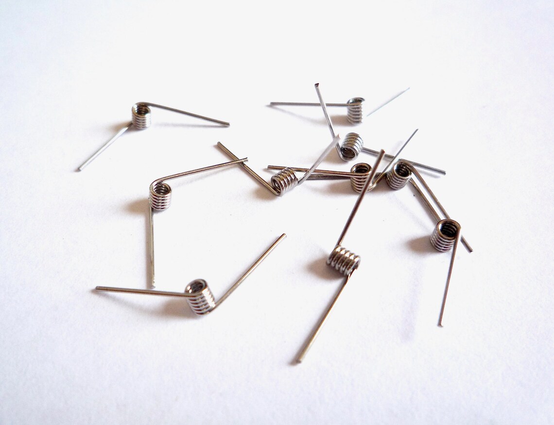 50 Tiny Steel Torsion Tension Coil Spring - Etsy