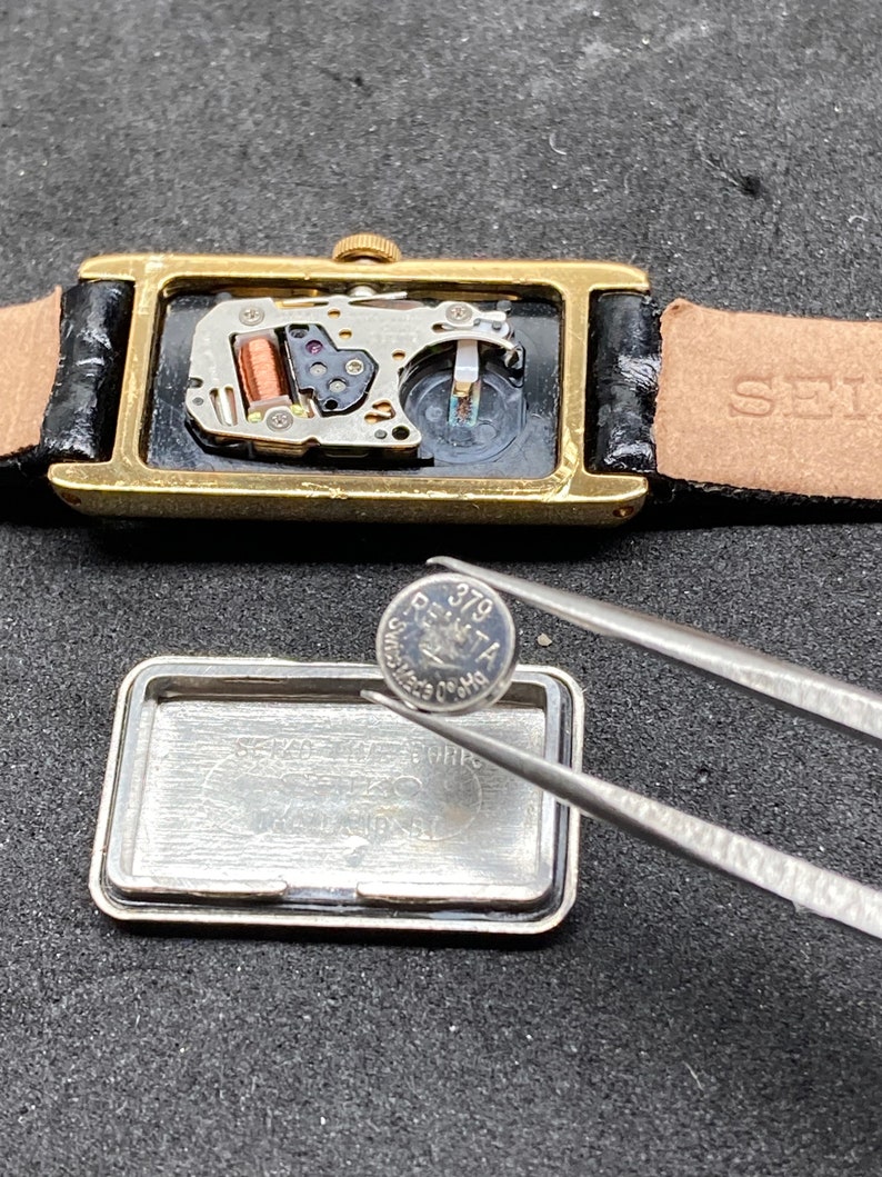 Retro 1987 Seiko Tank Roman Numeral Dial Gold Tone Tank Quartz Ladies Watch Reference SZZB18 W ...