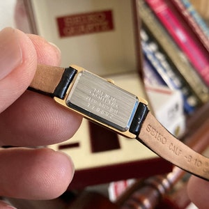 Retro 1987 Seiko Tank Roman Numeral Dial Gold Tone Tank Quartz Ladies Watch Reference SZZB18 W ...