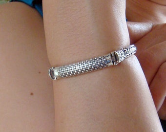 Braided sterling silver bracelet middle size with pusher clasp