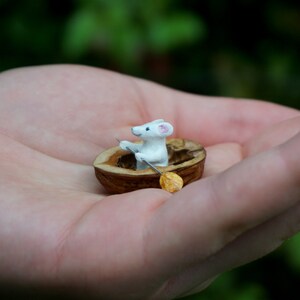 Miniature Mouse Paddling a Boat, Mjniature Mouse, Paddling Mouse, Mouse ...