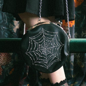 Spiderweb Convertible Clasp Handbag in Black - Spooky Halloween Fashion ...