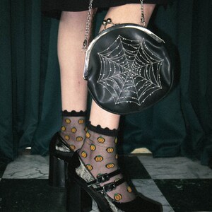 Spiderweb Convertible Clasp Handbag in Black - Spooky Halloween Fashion ...