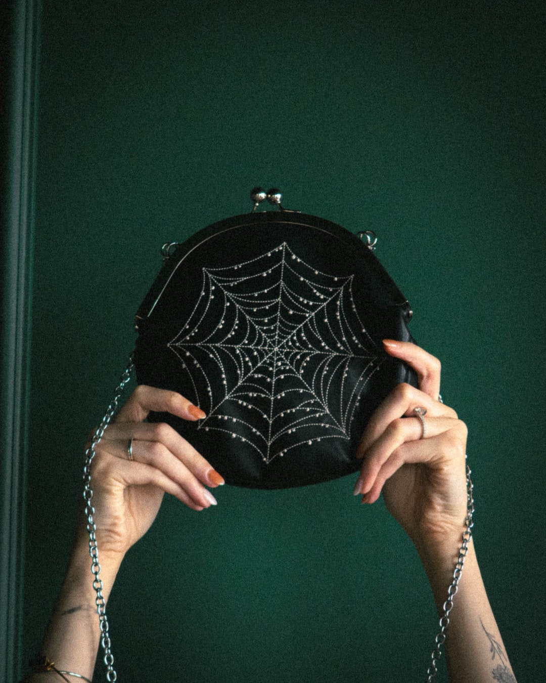 Spiderweb Convertible Clasp Handbag in Black - Spooky Halloween Fashion ...