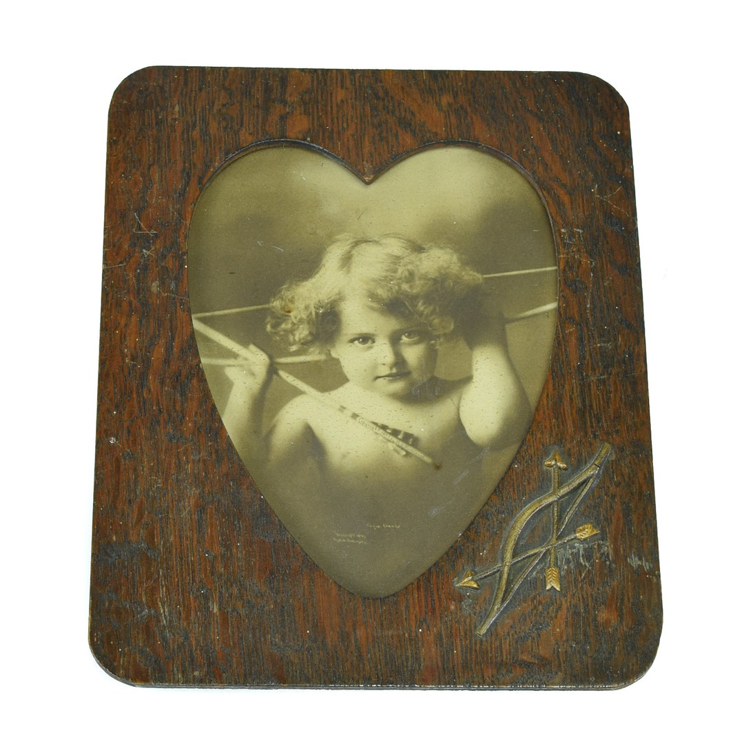 Cupid Awake and Asleep Photograph by M.B. Parkinson - Etsy