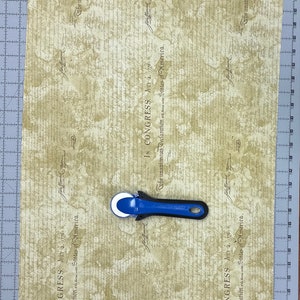 Colors of Courage Declaration All Over Fabric // Wilmington 3056 50010 ...