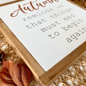 Autumn Reminds Us That Things Must End to Begin Again Framed Wood Sign ...