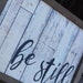 Be Still Wood Sign Script Text White Shiplap Brown Farmhouse Frame ...