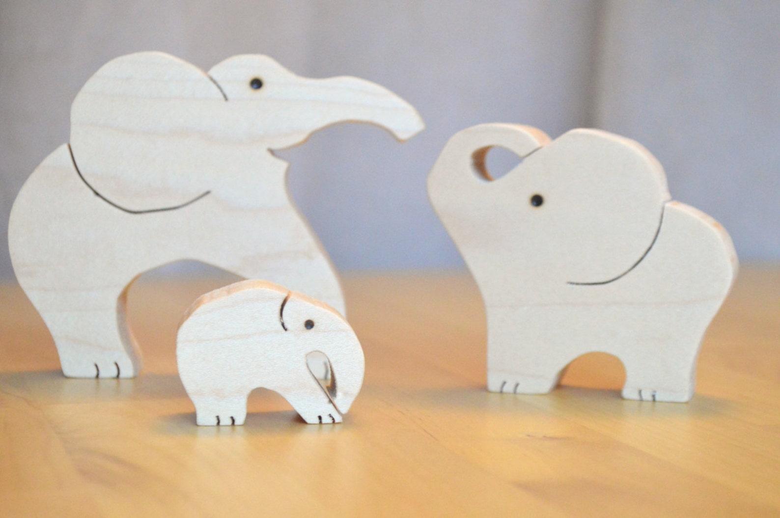 Wooden elephant family puzzle toy | Etsy