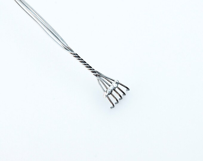 Fingers, a Stainless Steel Back Scratcher With Serial Number and ...