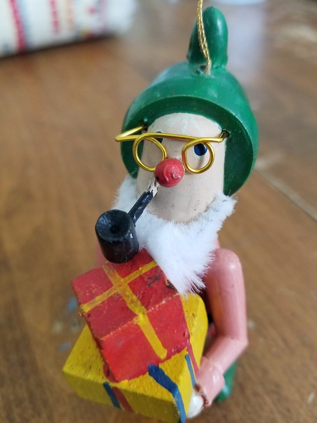 Wooden Toy Maker Christmas Ornament Holding Two Presents and Smoking a ...