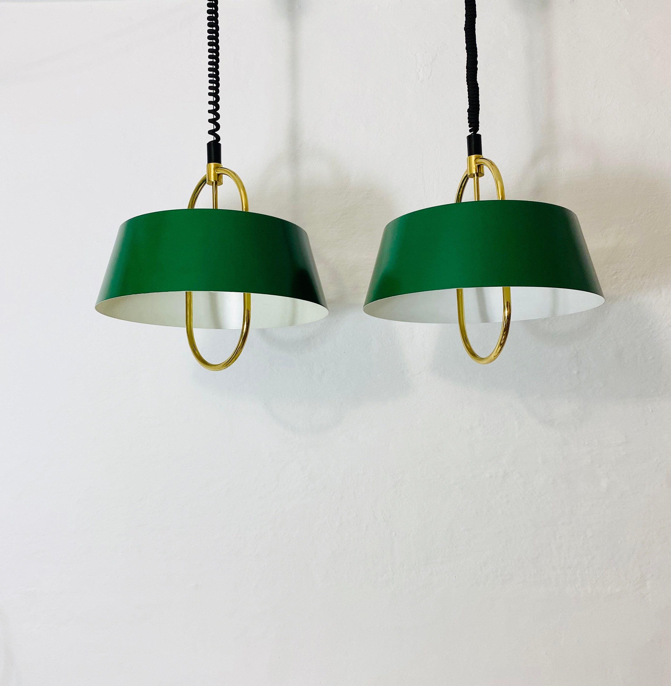 A pair of green and brass Hercules pendant lights by Jo | Etsy