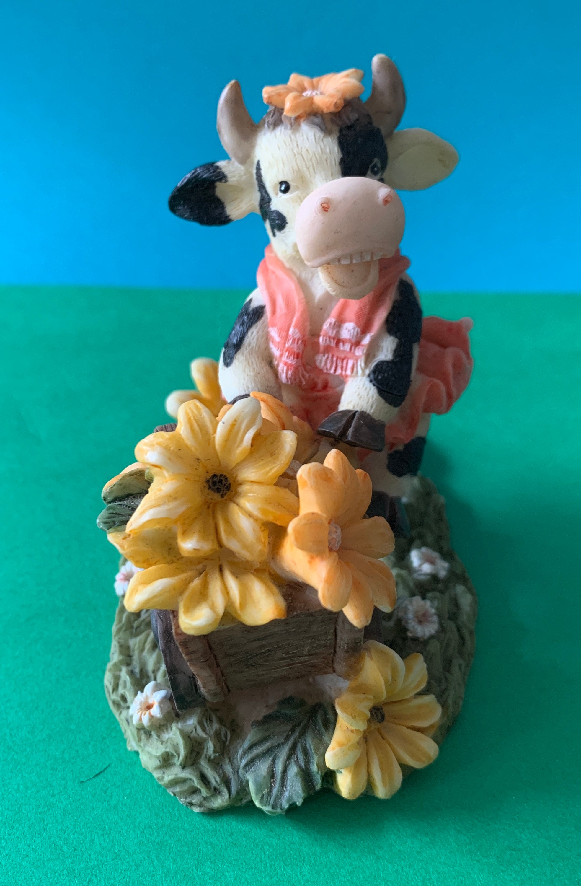 Vintage Cute Cow in a Pink Dress Pushing a Wheelbarrow Full of Yellow ...