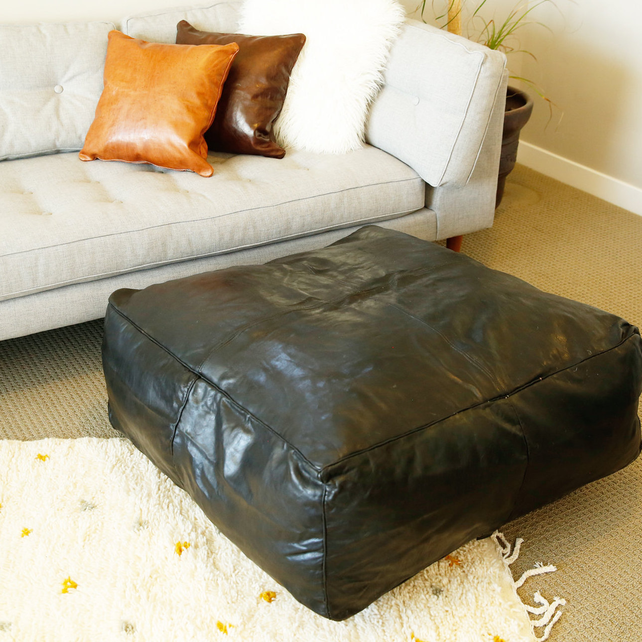 Oversized black ottoman store