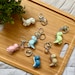 Chibi Iridescent Dinosaur Keychain - Etsy