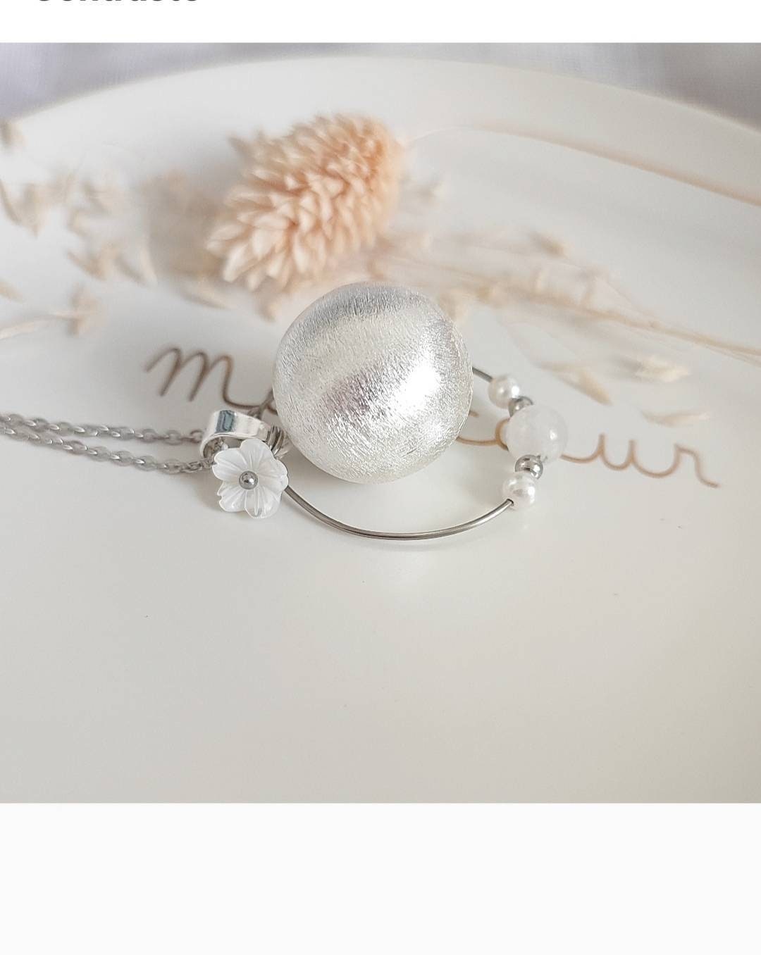 Brushed Silver Pregnancy Bola With Mother-of-pearl Flower Surrounded by ...