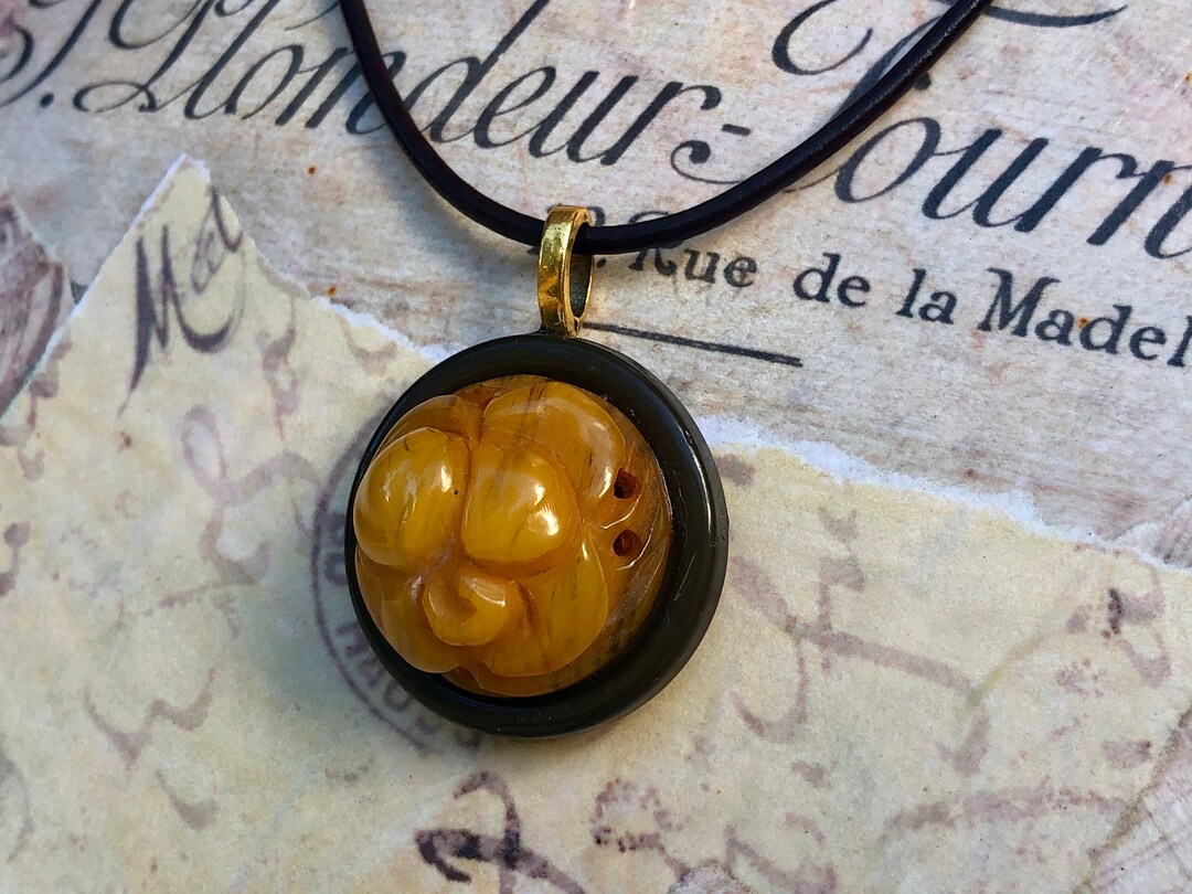 Vintage Hand Carved Honey Bakelite Button Necklace on Brown Leather ...