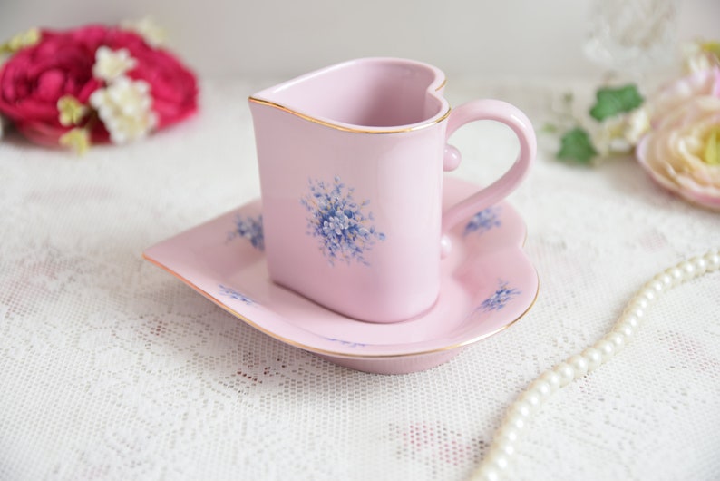 Heart-shaped Pink Cup and Saucer With Blue Floral Design and Gold Trim ...